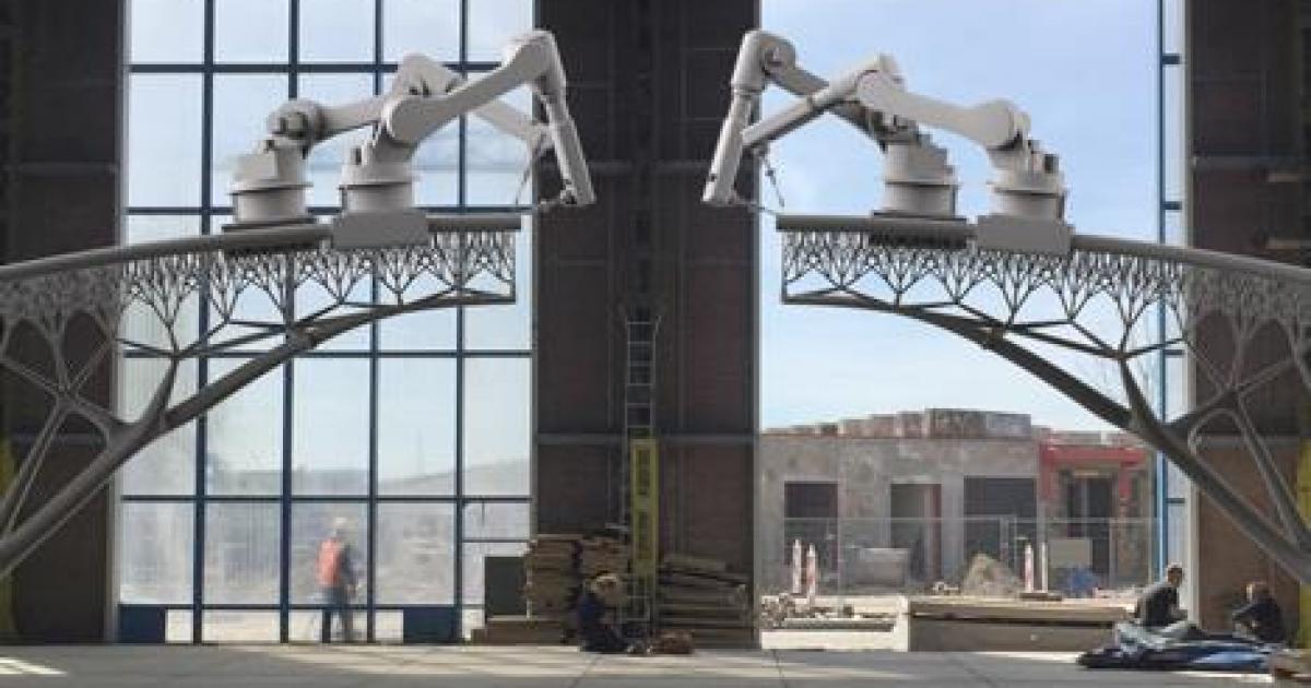 The 41-foot-long bridge took four robots, 9920 pounds of stainless ...